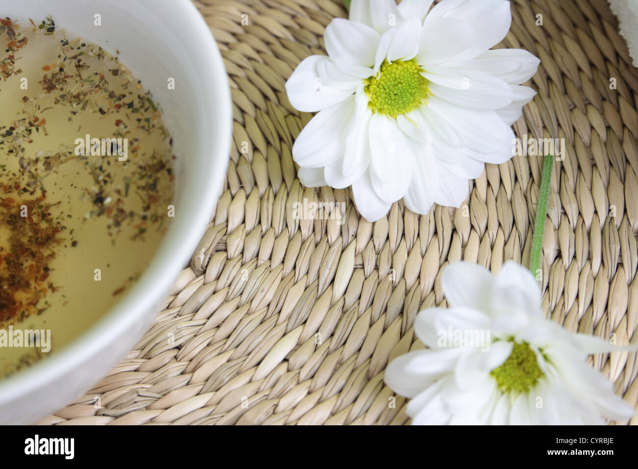 Spa design with herb and daisy Stock Photo - Alamy
