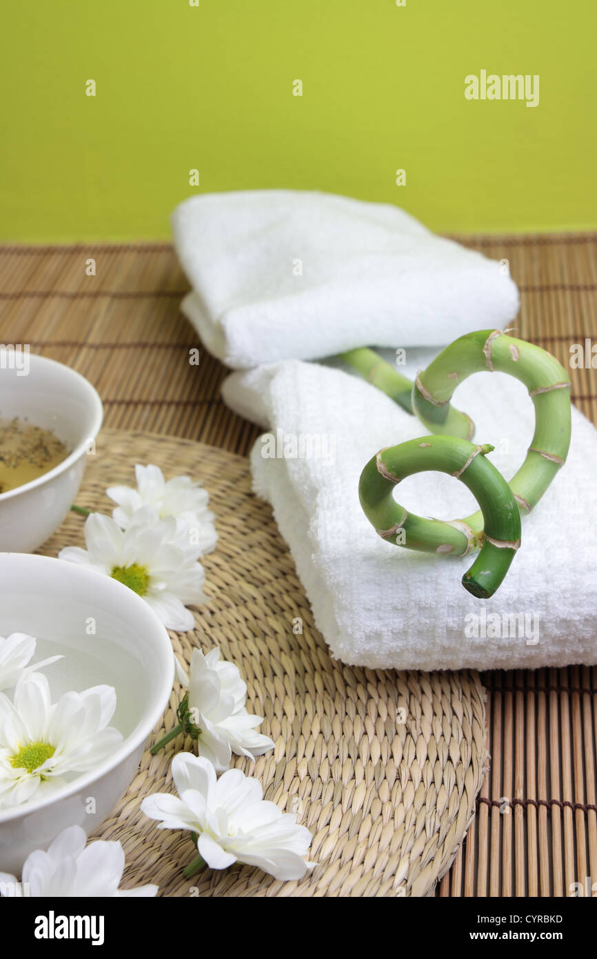Spa design with herb and daisy Stock Photo - Alamy