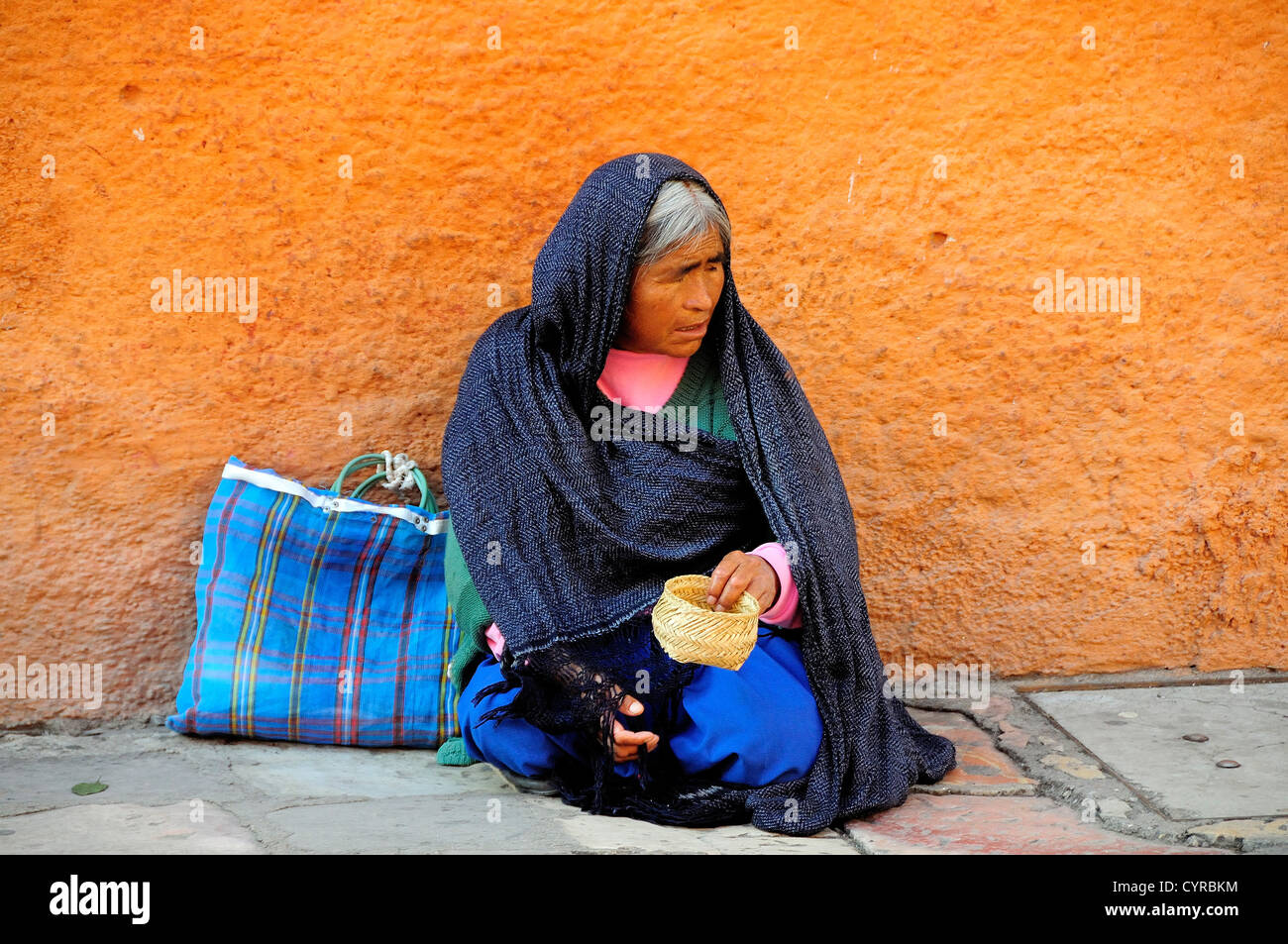 Woman begging on street corner hi-res stock photography and images - Alamy