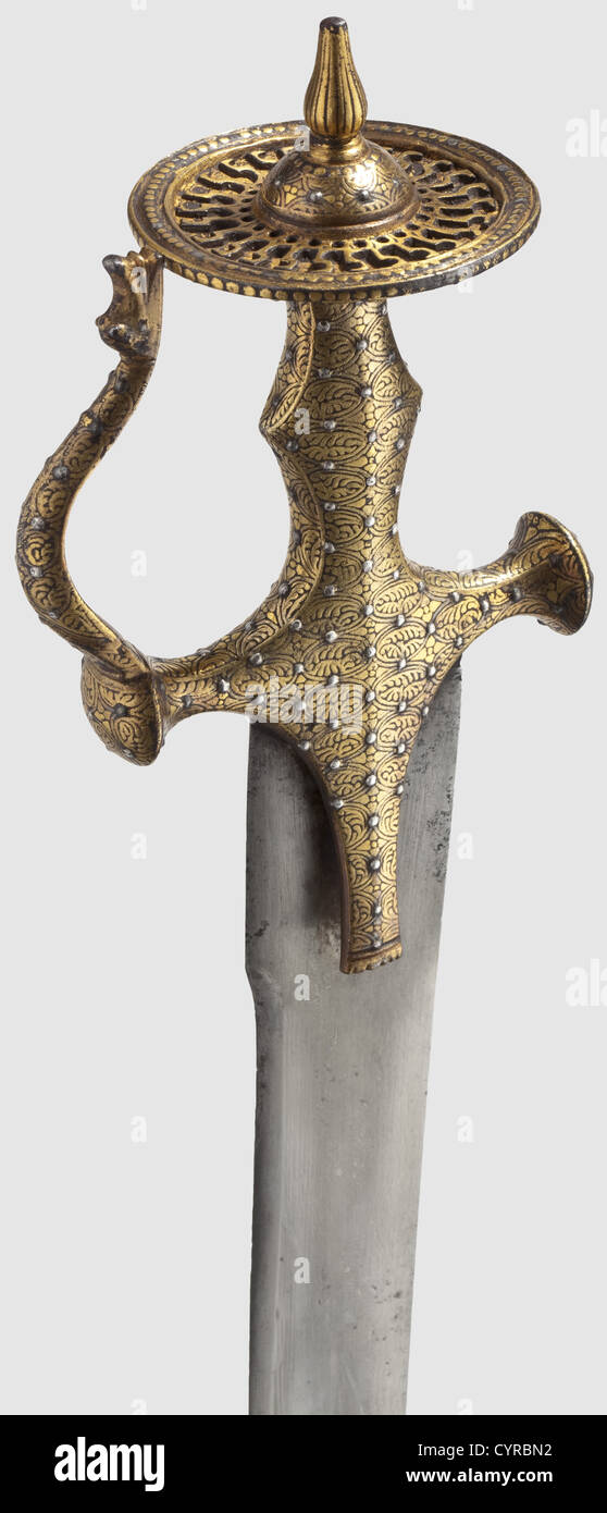 An Indian gold-inlaid tulwar, 19th century Heavy wootz-Damascus blade ...