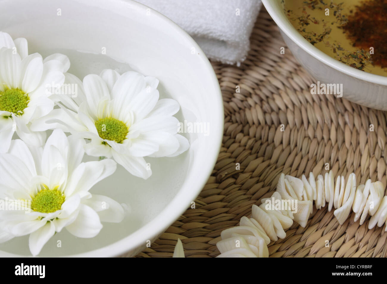 Spa design with herb and daisy Stock Photo - Alamy