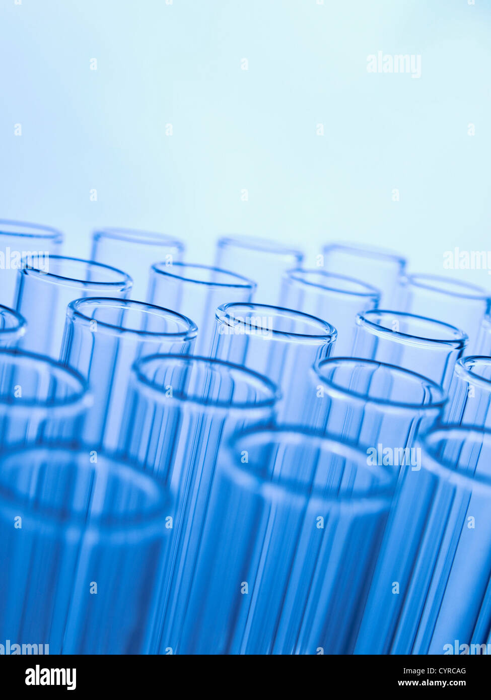 Close up of several test tubes in a blue tone Stock Photo - Alamy