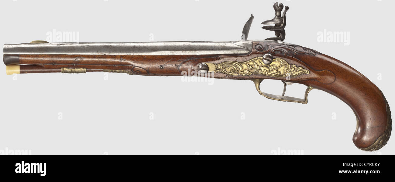 A pair of German flintlock pistols,circa 1760. Smooth bore barrels in ...