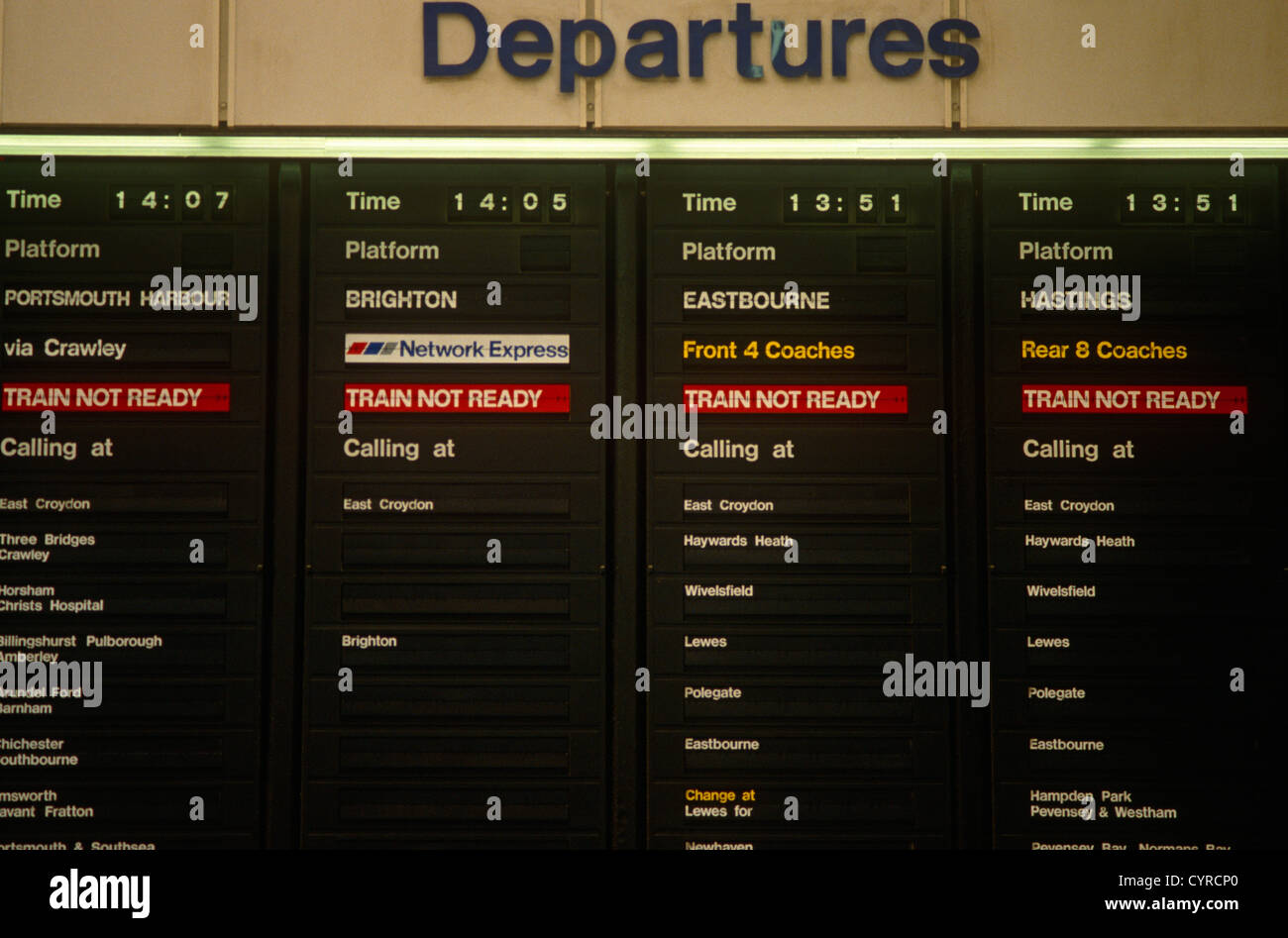 A 90s departures board displays the times and destinations of rail ...