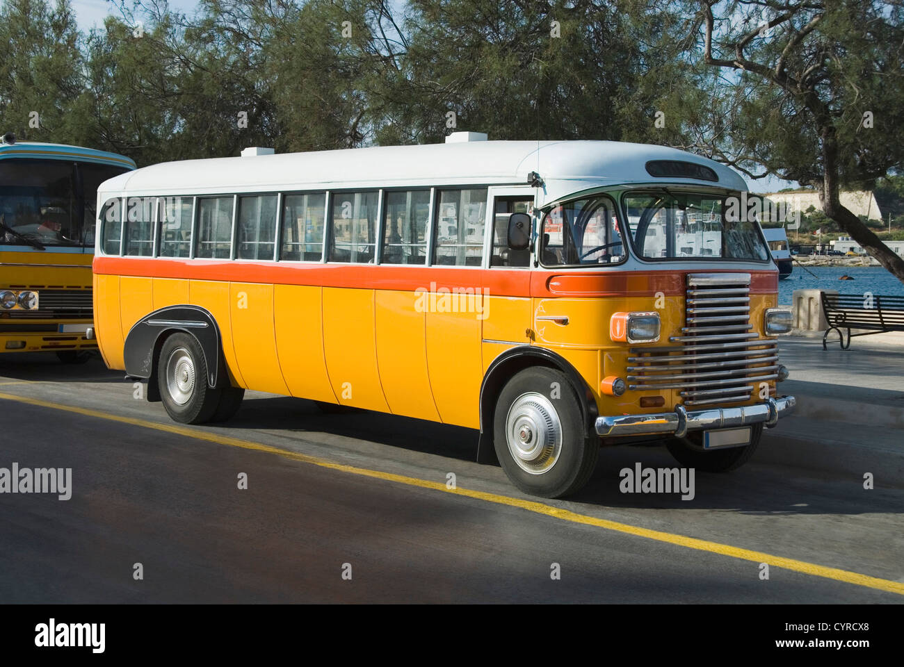 Buses on the road, Valletta, Malta Stock Photo - Alamy