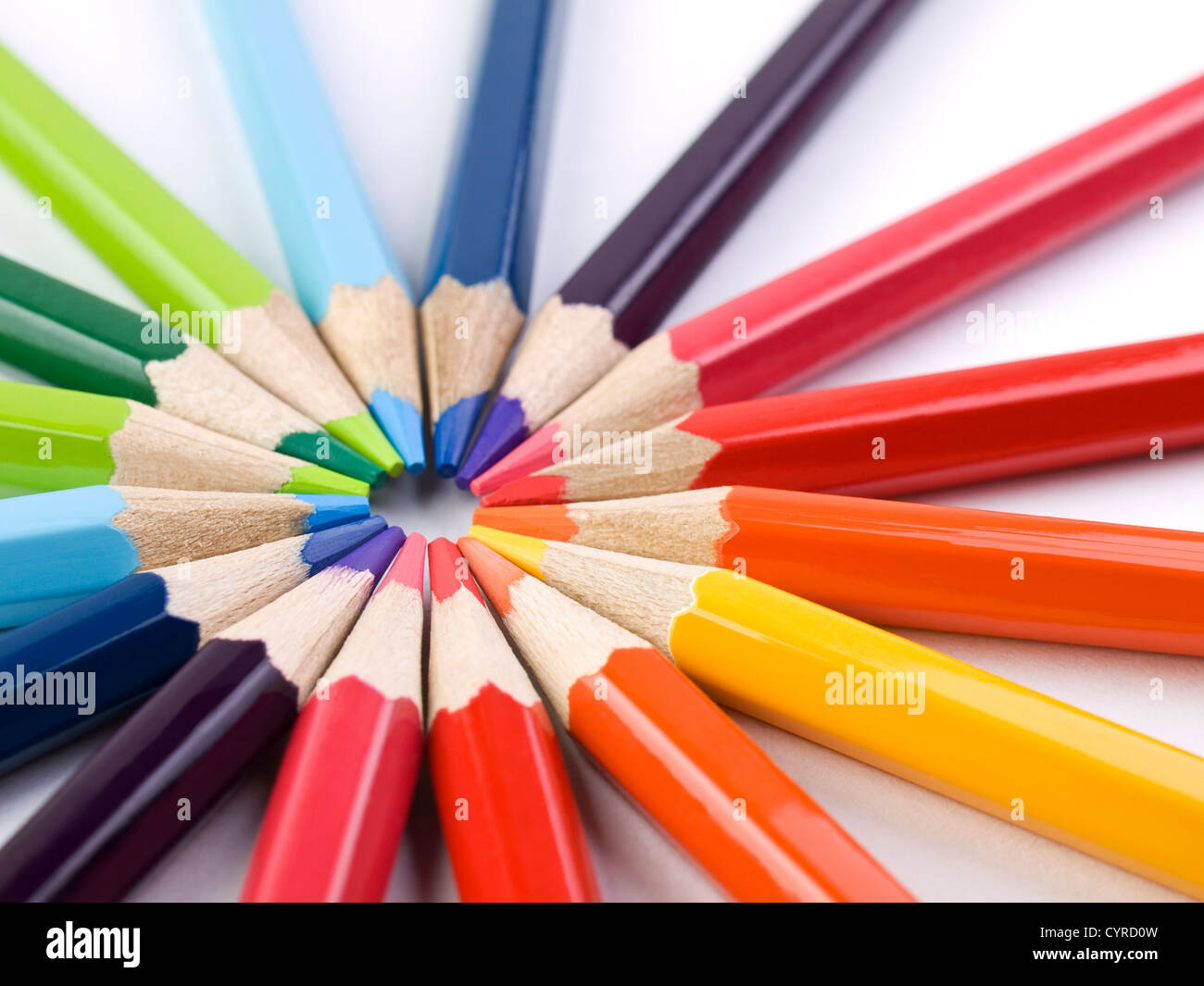 A circle formed by the points of several colored pencils Stock Photo ...