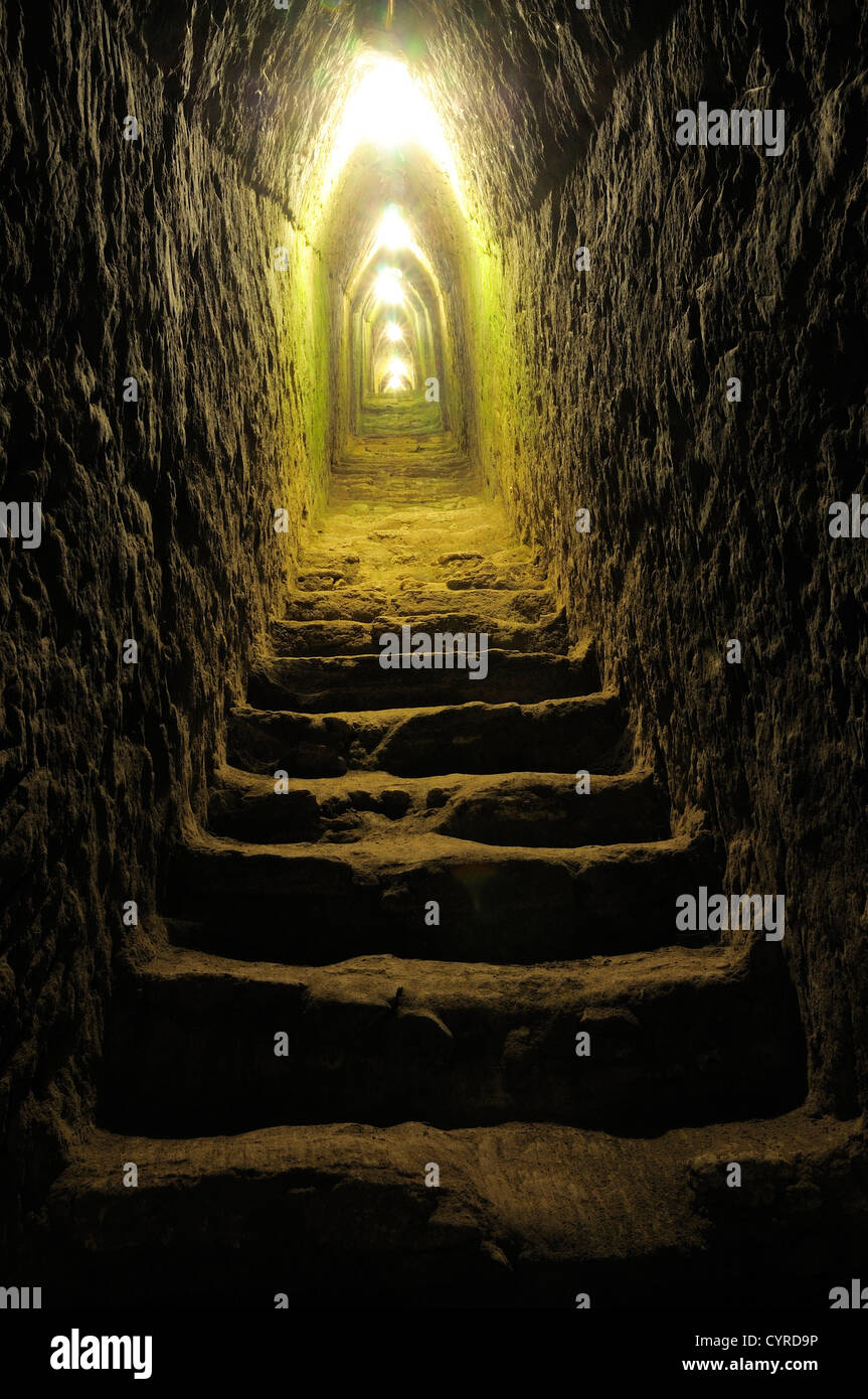 Mexico, Puebla, Narrow, deserted exploratory narrow stepped tunnels ...