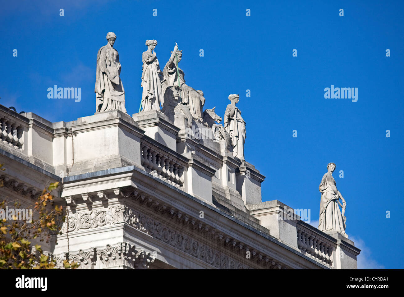 London, Whitehall A rooftop statue of Queen Victoria overlooking the ...