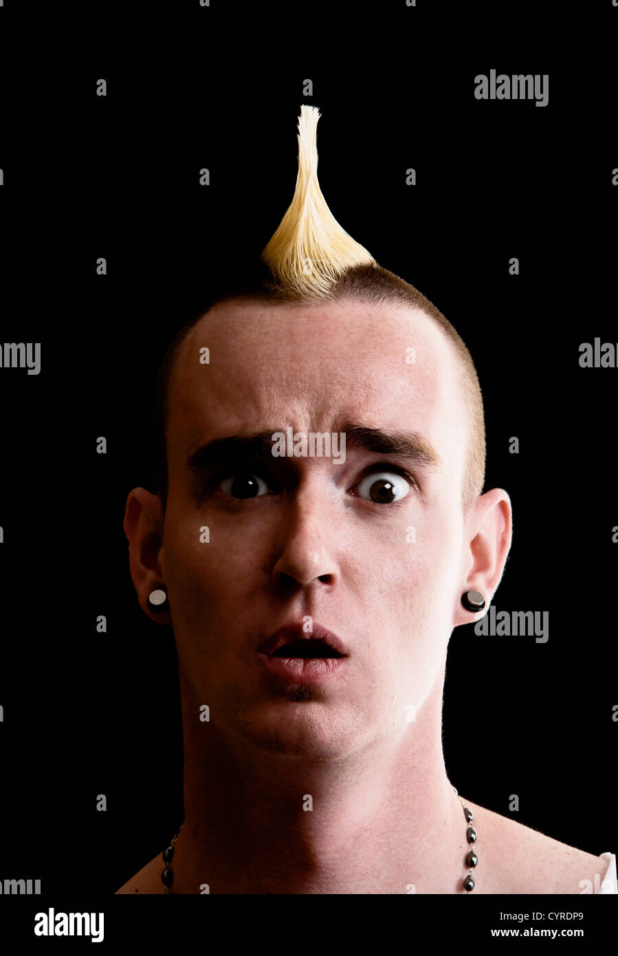Confused Man with a Tall Yellow Mohawk Stock Photo - Alamy