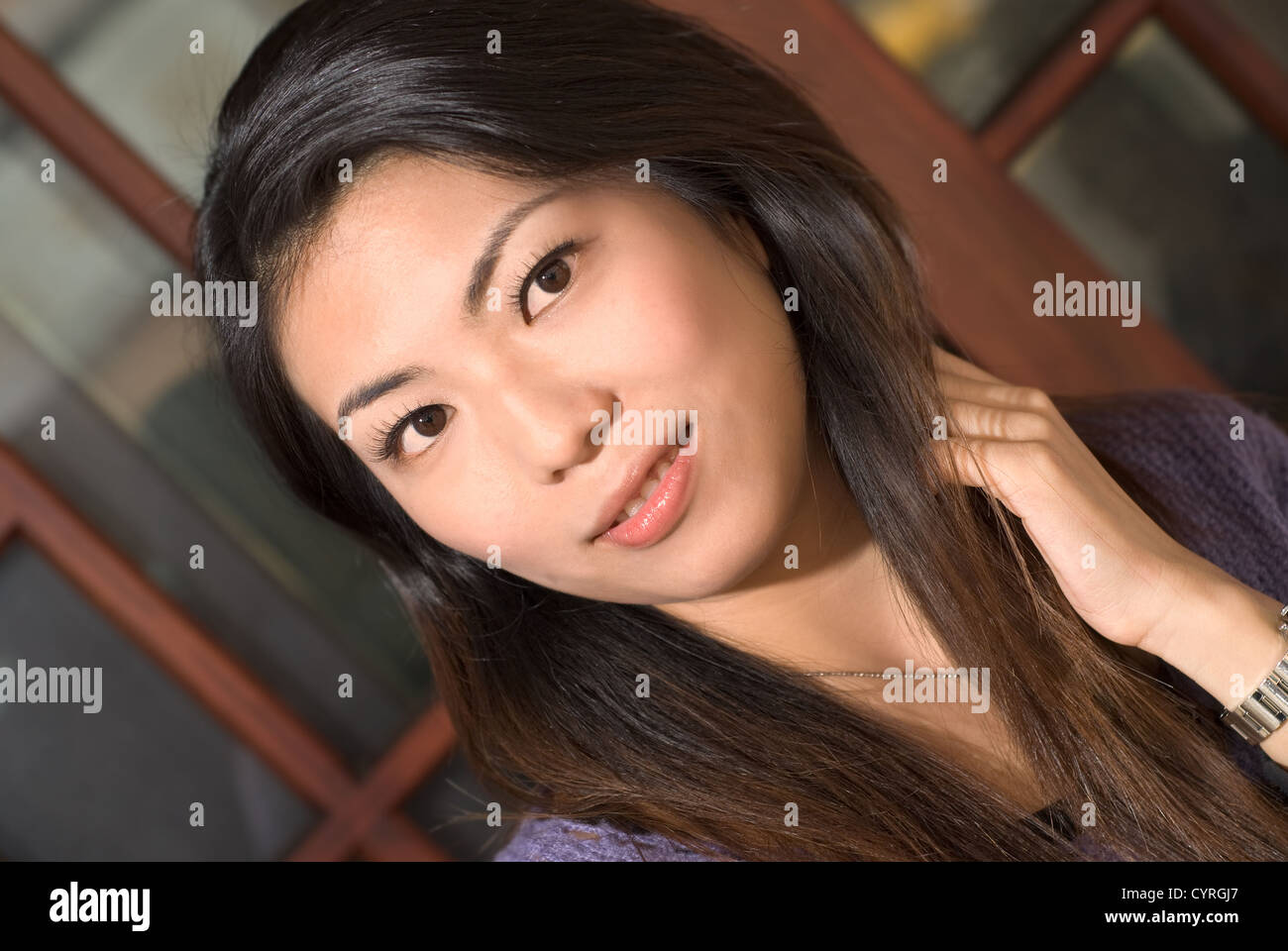 Asian woman portrait with black hair and yellow skin Stock Photo - Alamy