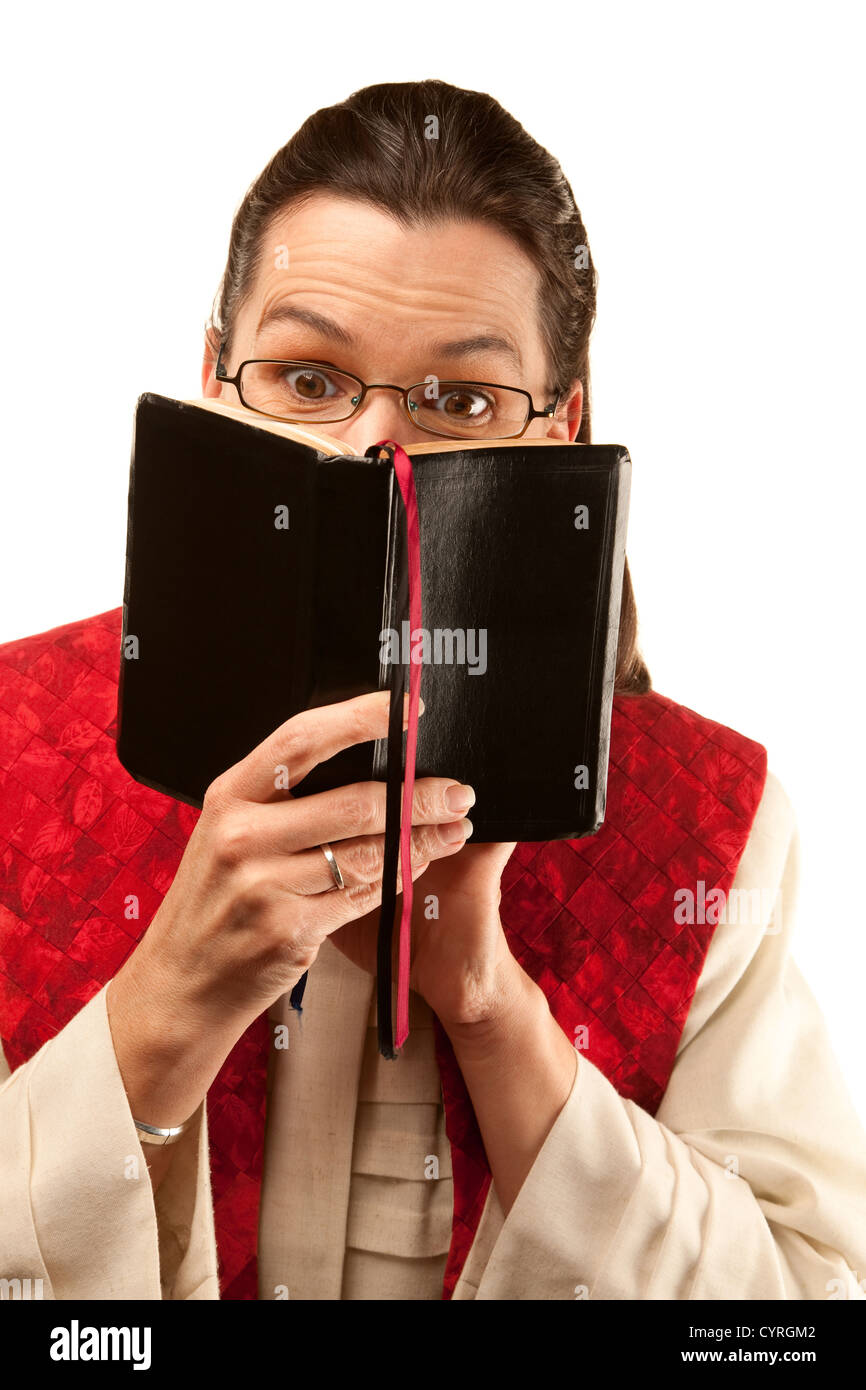Female preacher with Bible and holy garments Stock Photo - Alamy