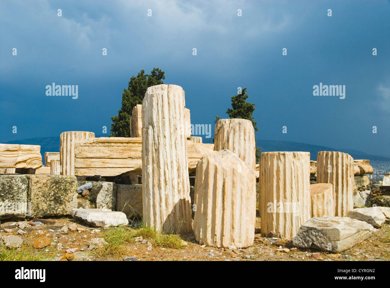 Ruins of columns in a field, Acropolis, Athens, Greece Stock Photo - Alamy