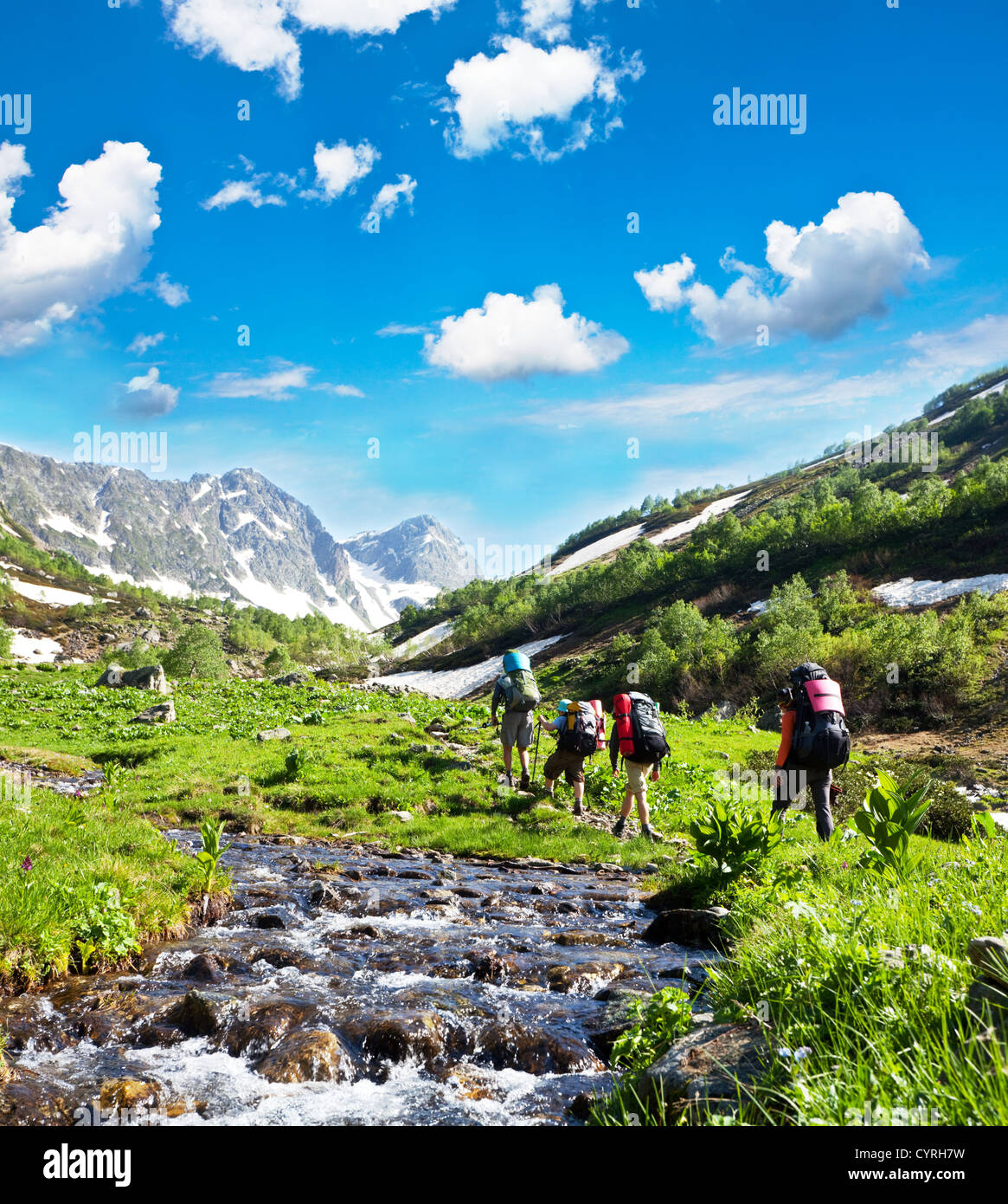 Hiker in mountains Stock Photo - Alamy
