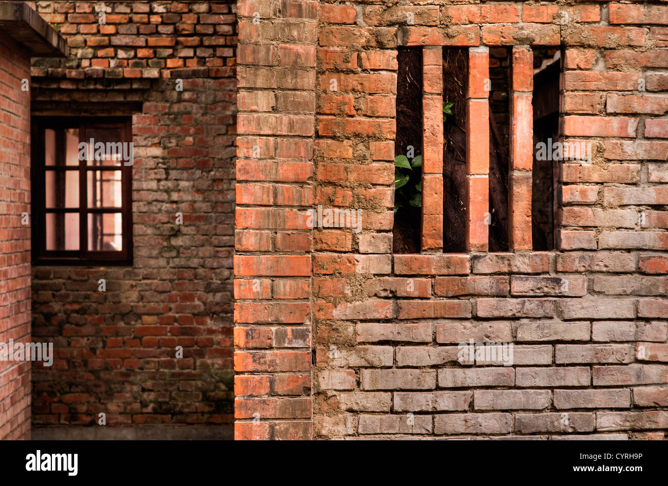 Scary old ruin with red brick wall Stock Photo - Alamy