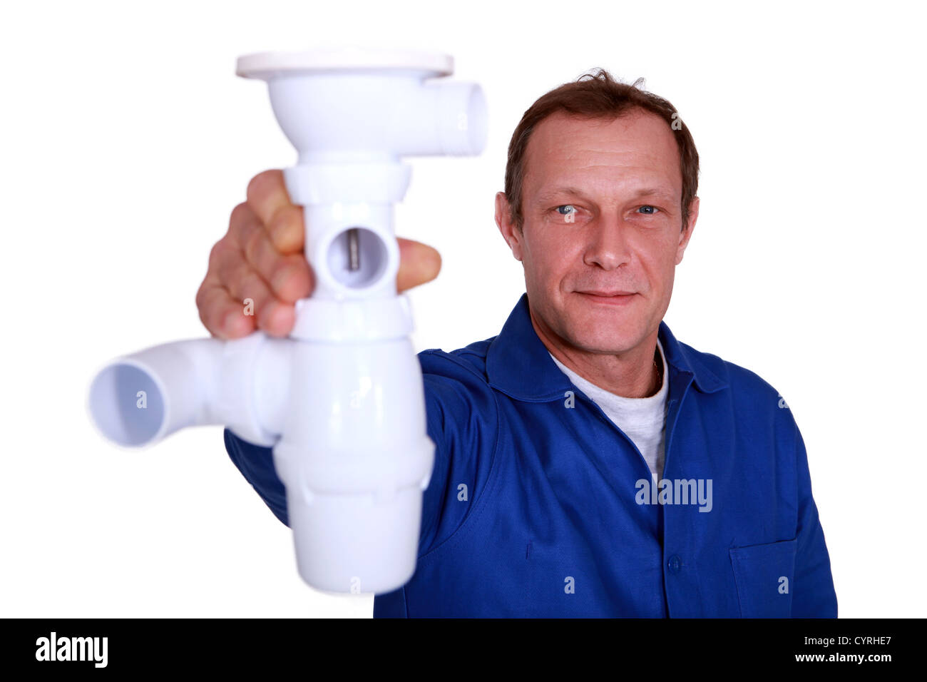 Plumber holding replacement part Stock Photo - Alamy
