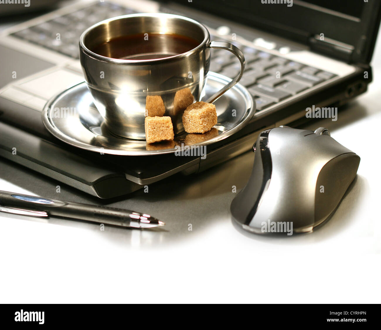 Morning coffee break with laptop,pen and computer mouse Stock Photo - Alamy