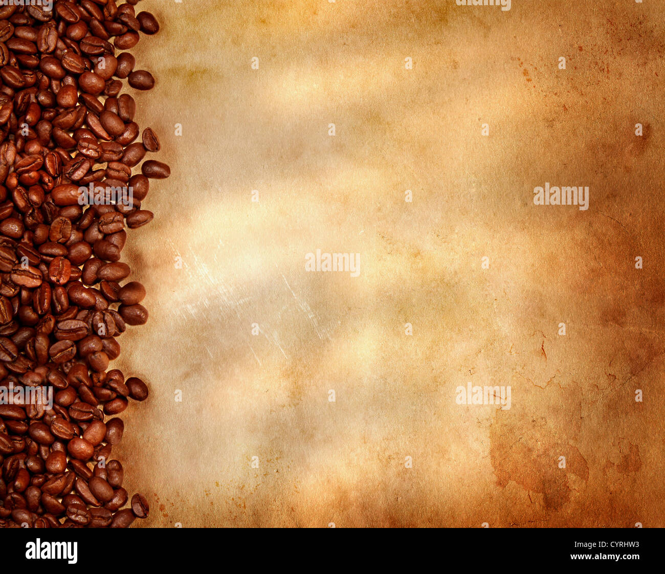 Coffee beans on old parchment paper Stock Photo - Alamy