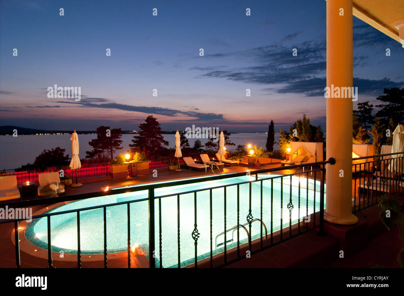 Swimming pool of luxury hotel at night Stock Photo - Alamy