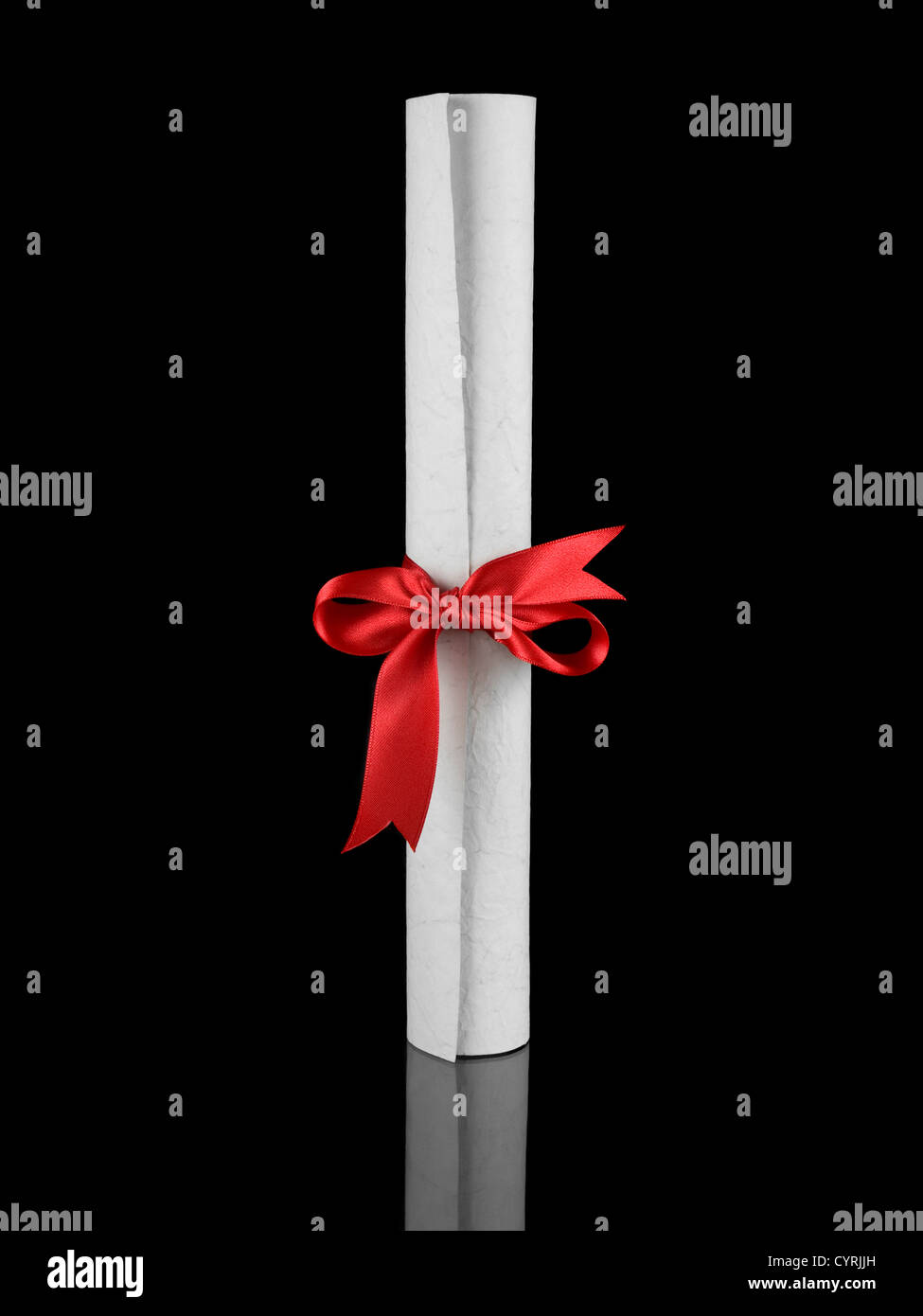Diploma with a red silk ribbon, isolated on black background Stock ...