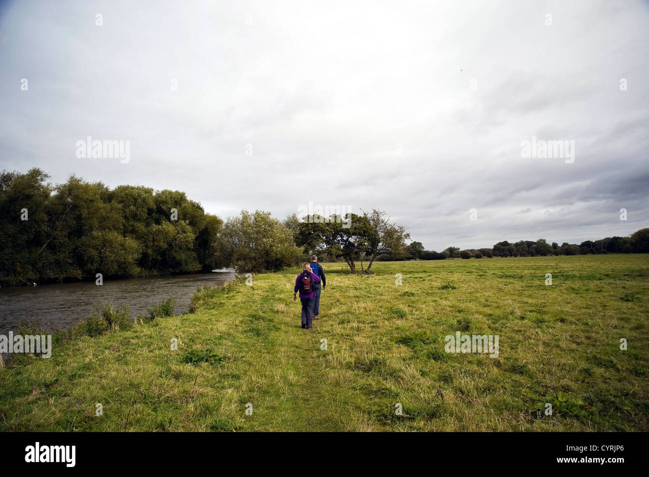 Walkers on the Ridgeway National Trail on the River Thames near South ...