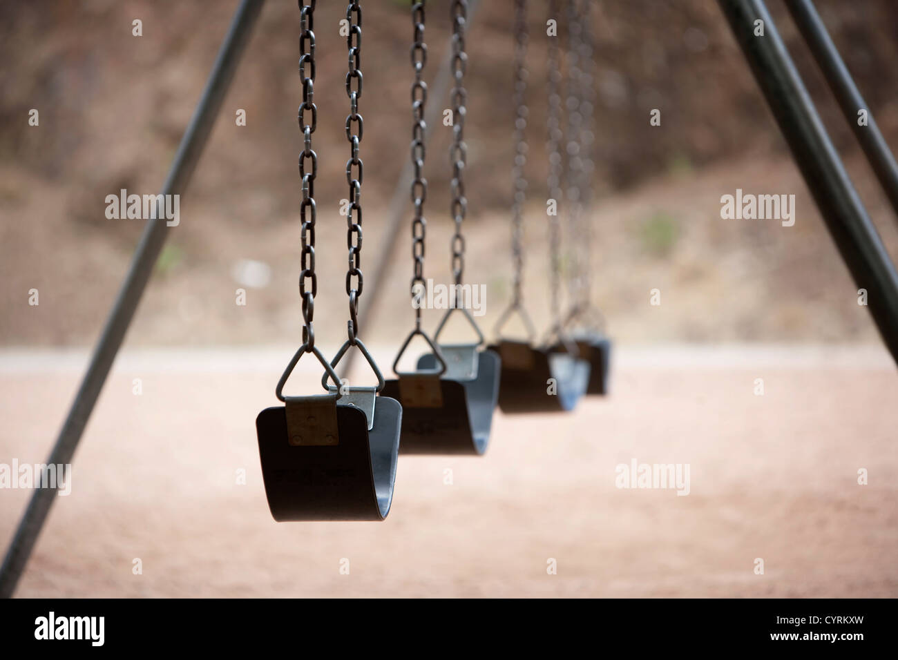 Old style playground swings with chains and rubber seats Stock Photo ...