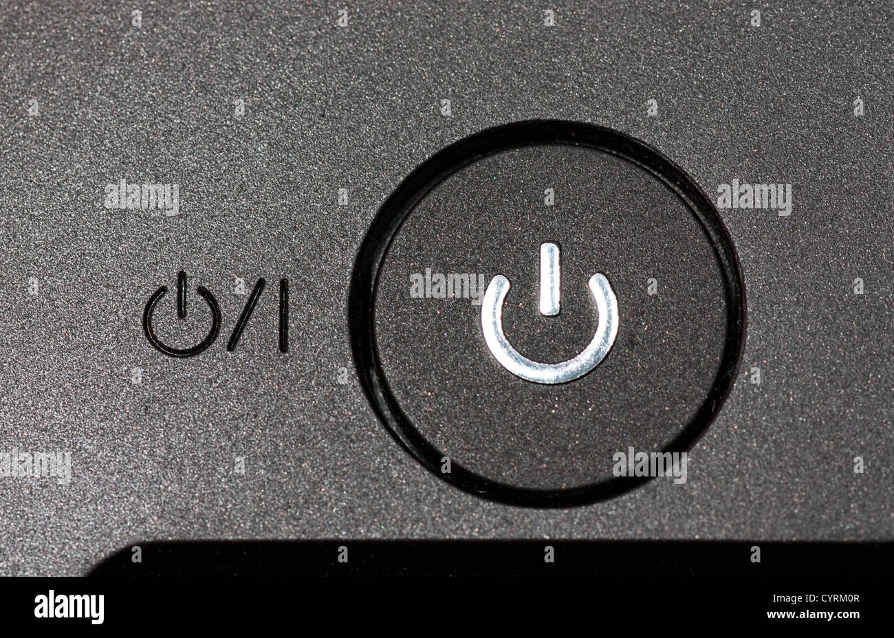 Black power button of laptop. Macro view Stock Photo - Alamy