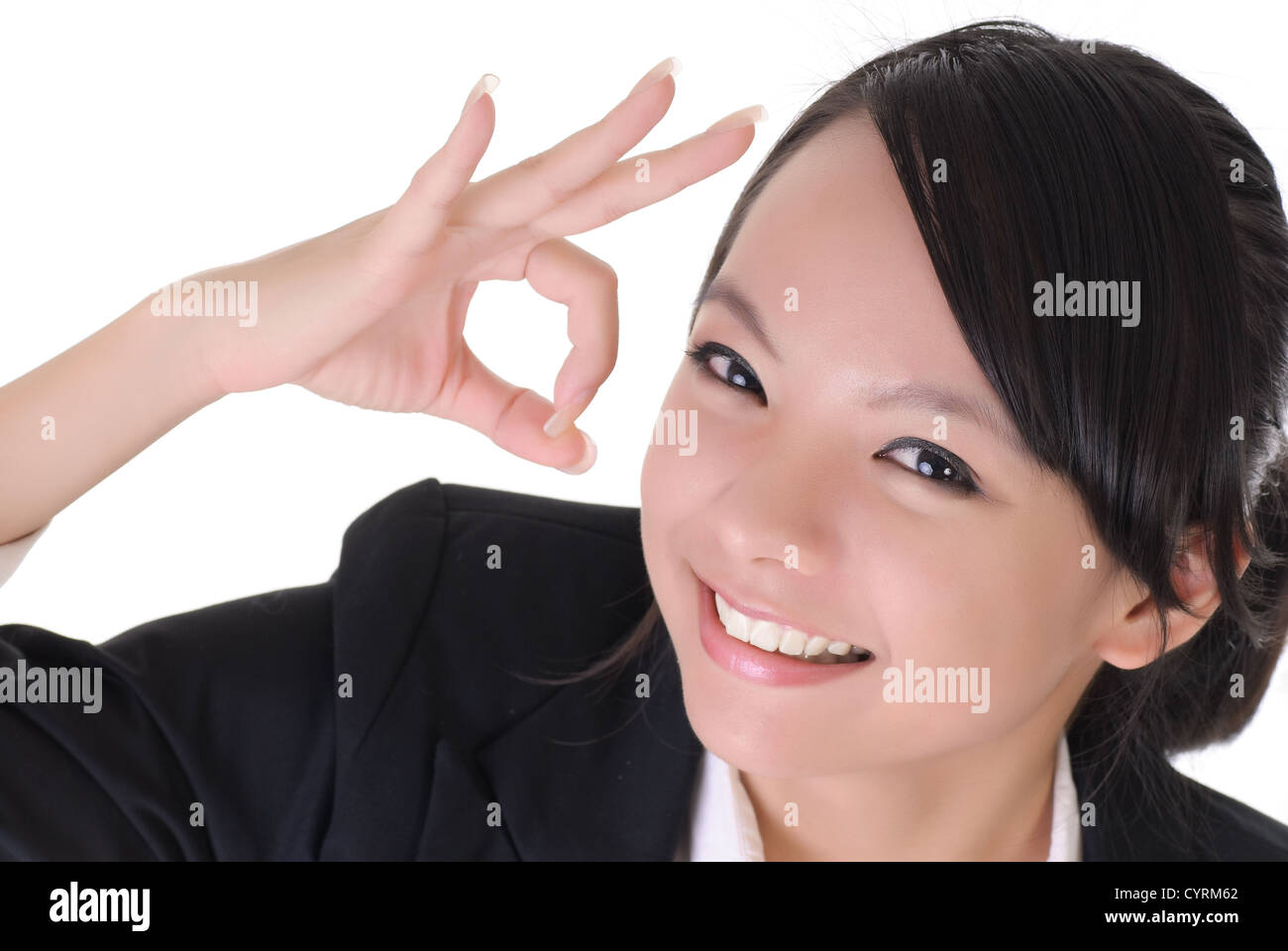 Business woman show ok gesture with delight expression, closeup ...