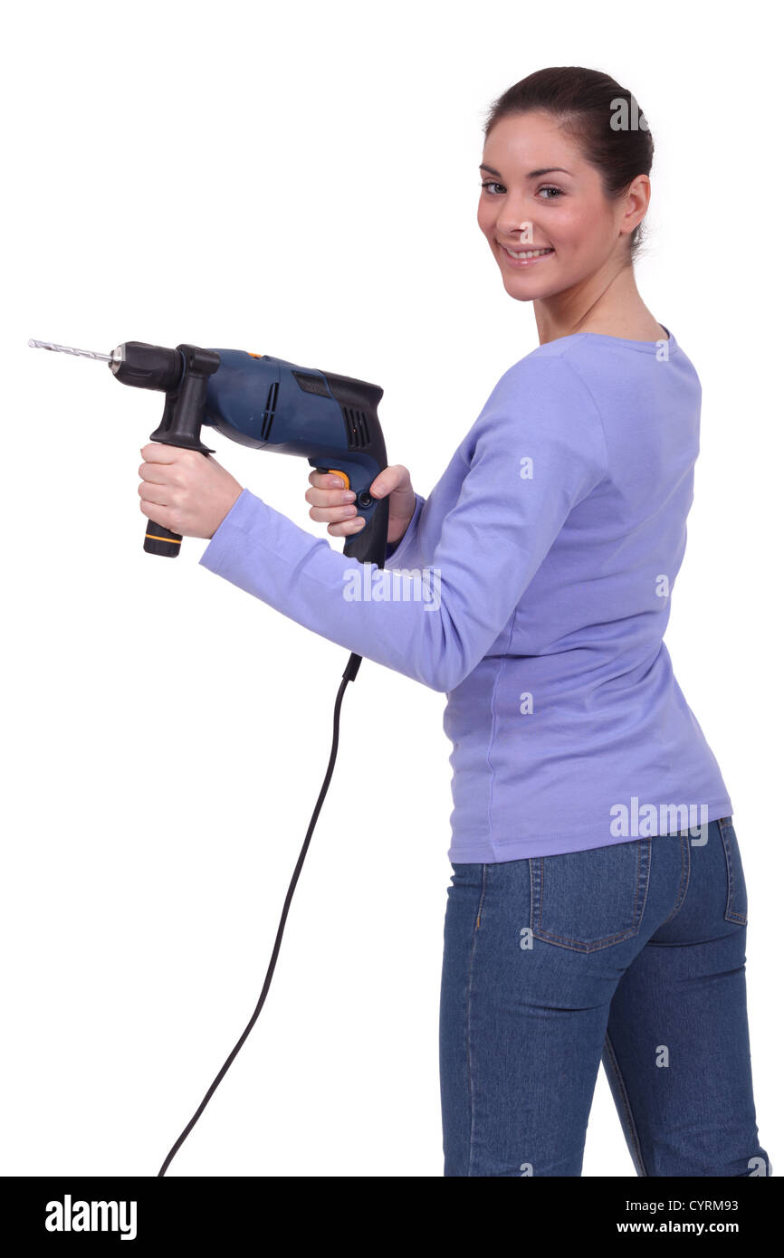Woman with drill Stock Photo - Alamy