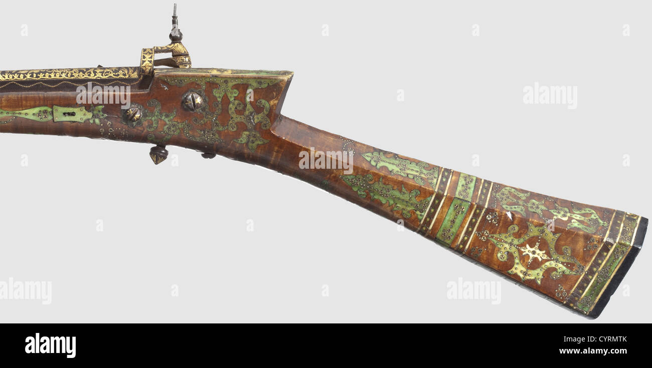 An Ottoman gold-inlaid miquelet-lock rifle,18th century Round,seven ...