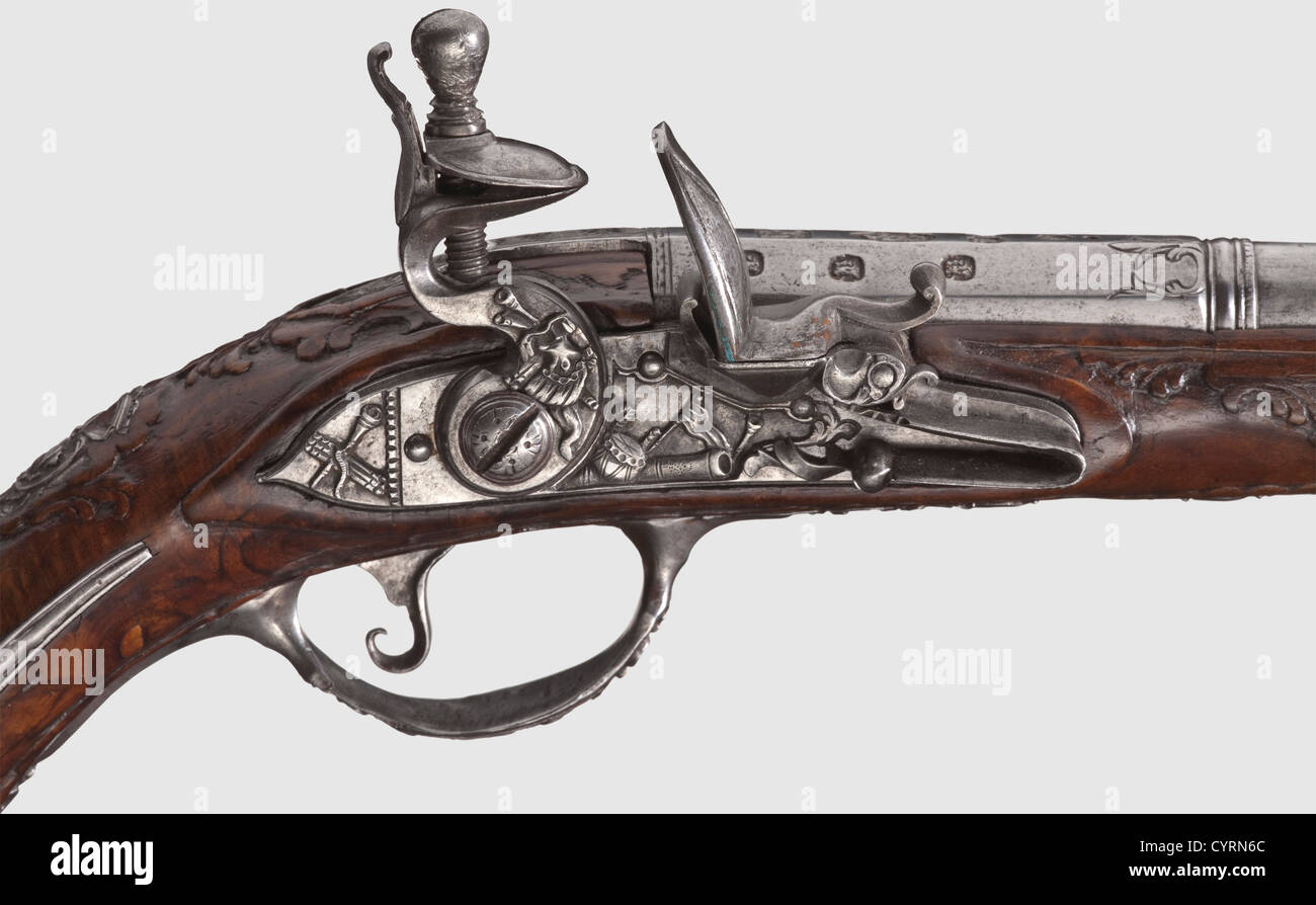 An Italian chiselled flintlock pistol,1st half of the 18th century. Two ...