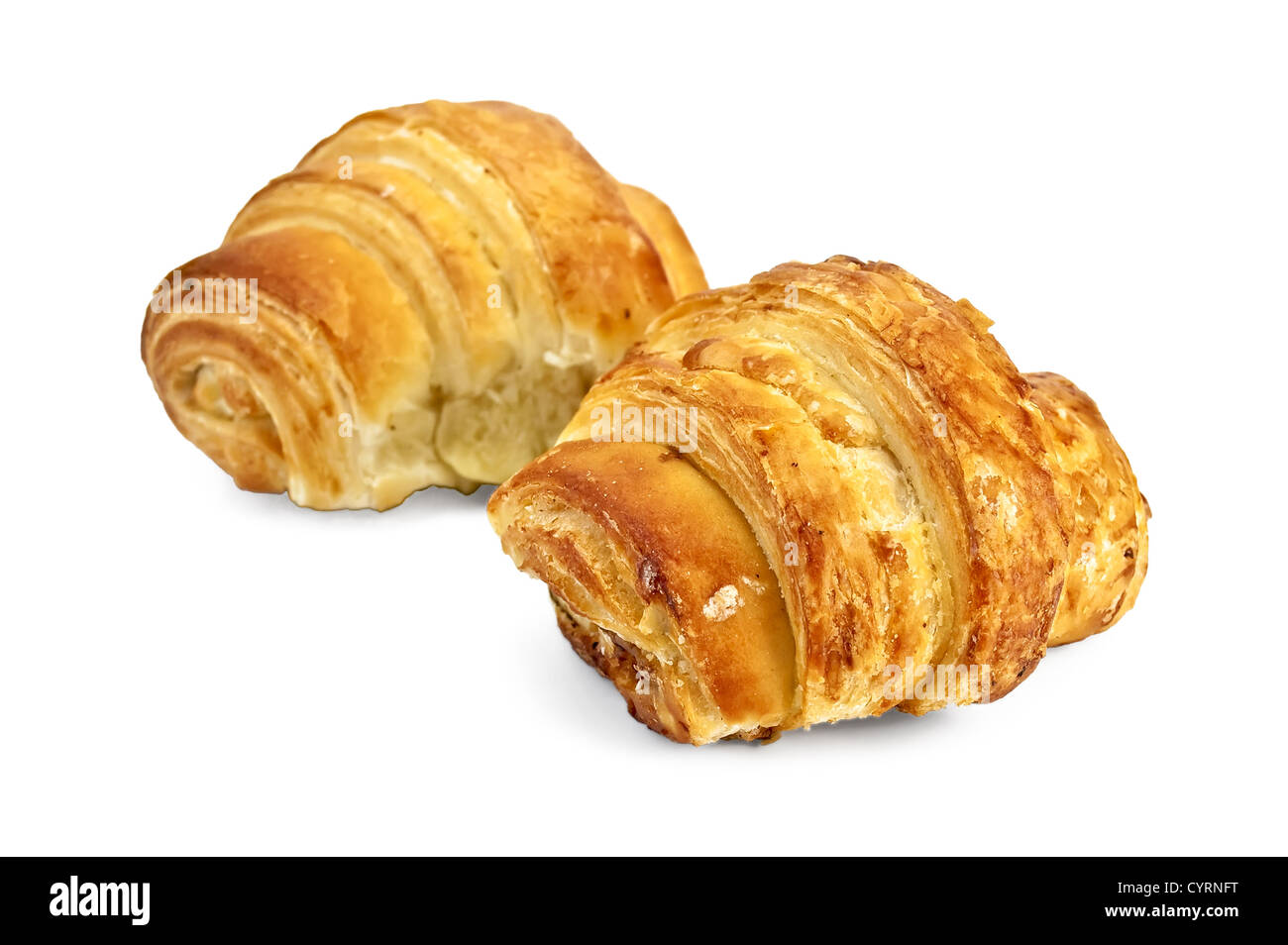 Two golden croissant isolated on white background Stock Photo - Alamy