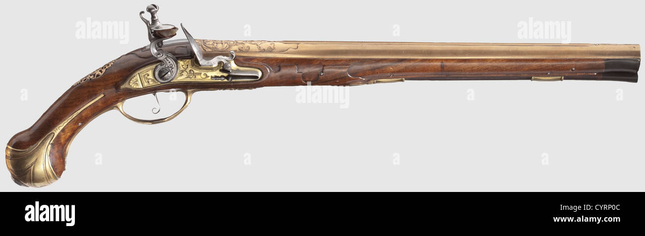 A long Flemish flintlock pistol,circa 1720. Round,bronze smooth bore in ...