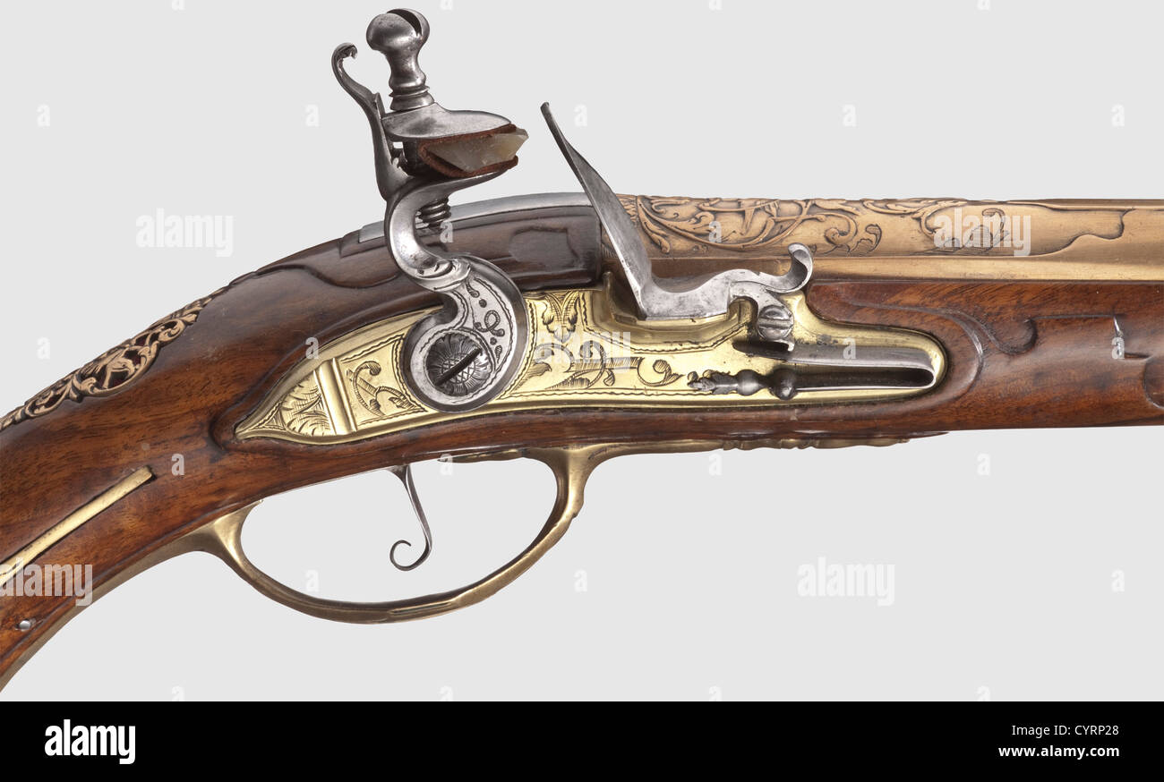 A long Flemish flintlock pistol,circa 1720. Round,bronze smooth bore in ...