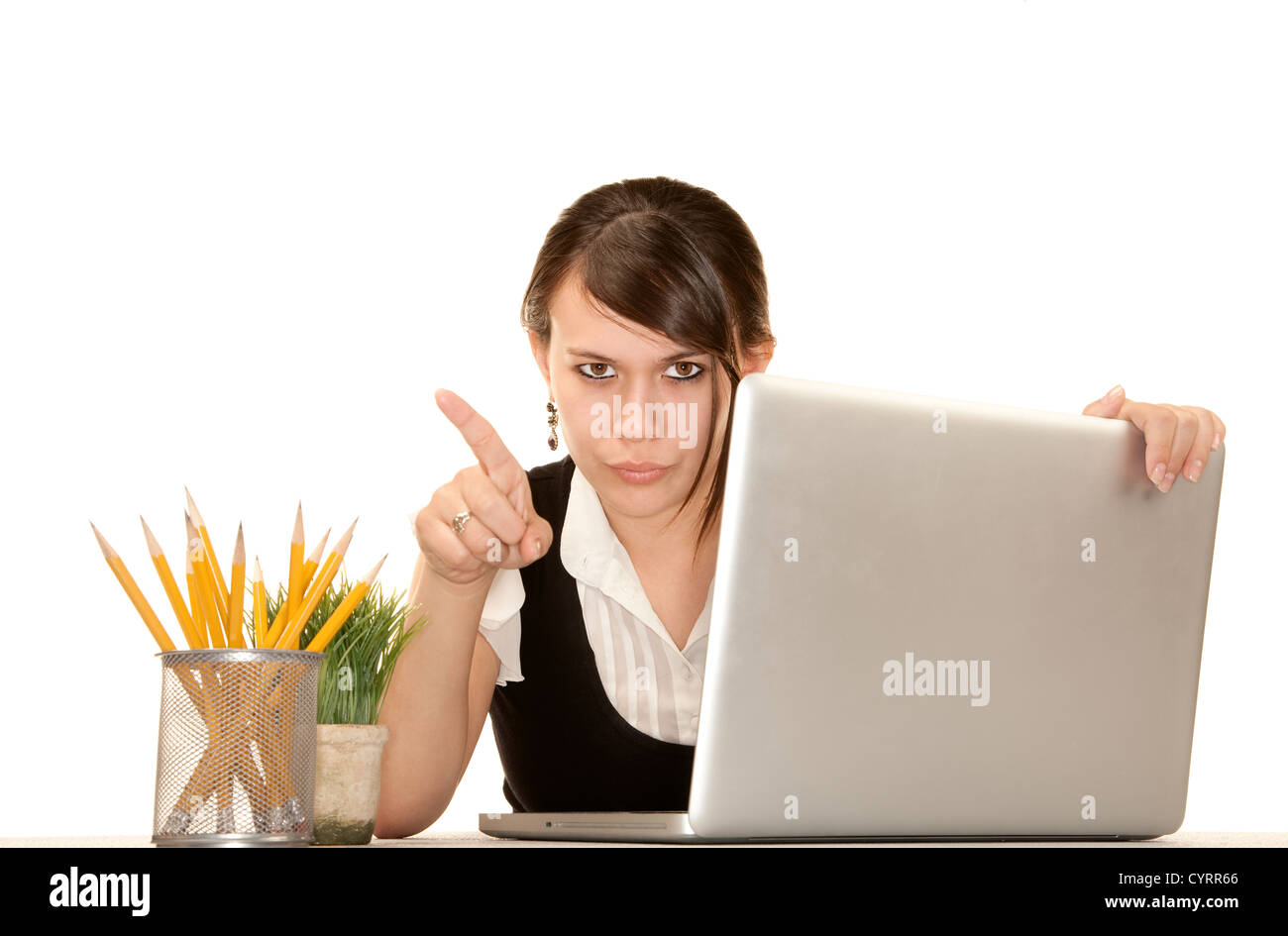 Pretty female office worker with laptop computer Stock Photo - Alamy