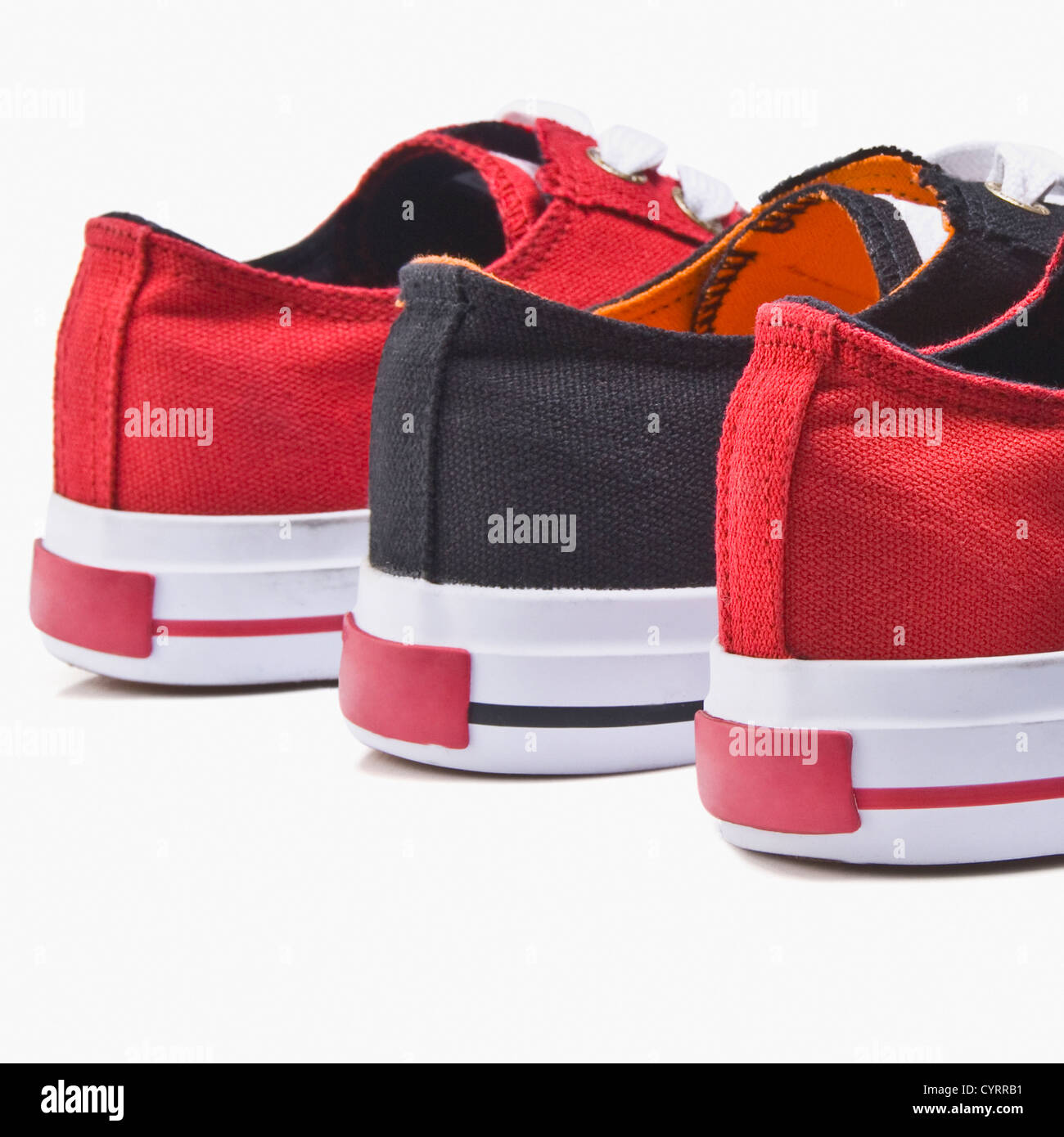 Close-up of canvas shoes in a row Stock Photo - Alamy