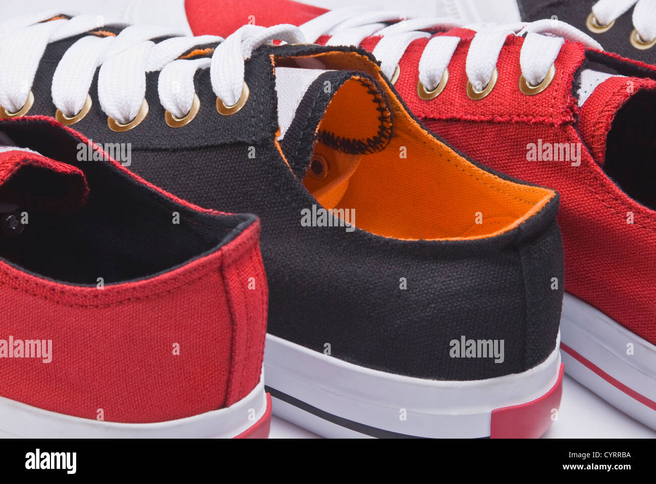 Close-up of canvas shoes in a row Stock Photo - Alamy