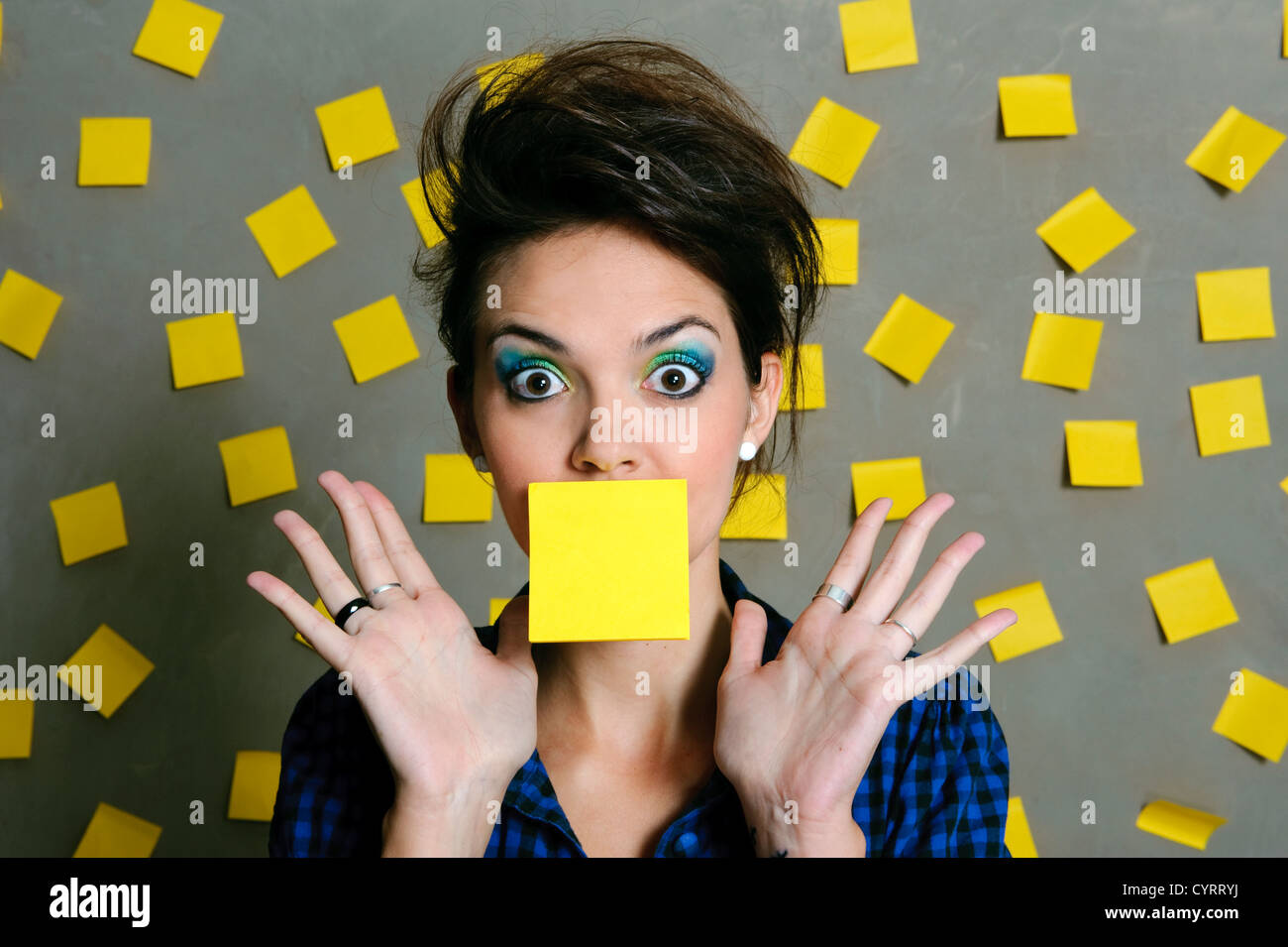 Pretty fashion model with hundreds of post it notes Stock Photo - Alamy