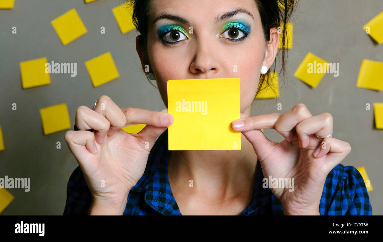 Pretty fashion model with hundreds of post it notes Stock Photo - Alamy