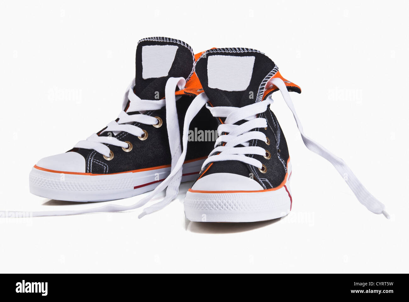 White canvas tennis shoes hi-res stock photography and images - Alamy