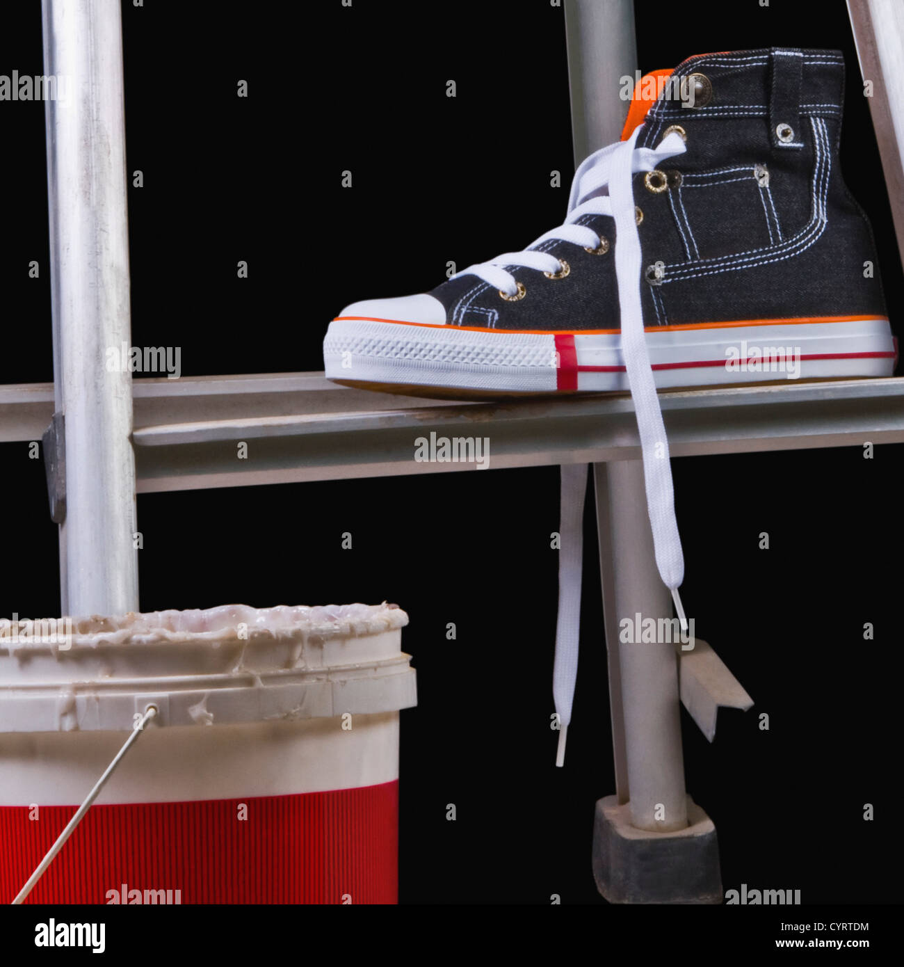 Shoe on a step ladder Stock Photo - Alamy