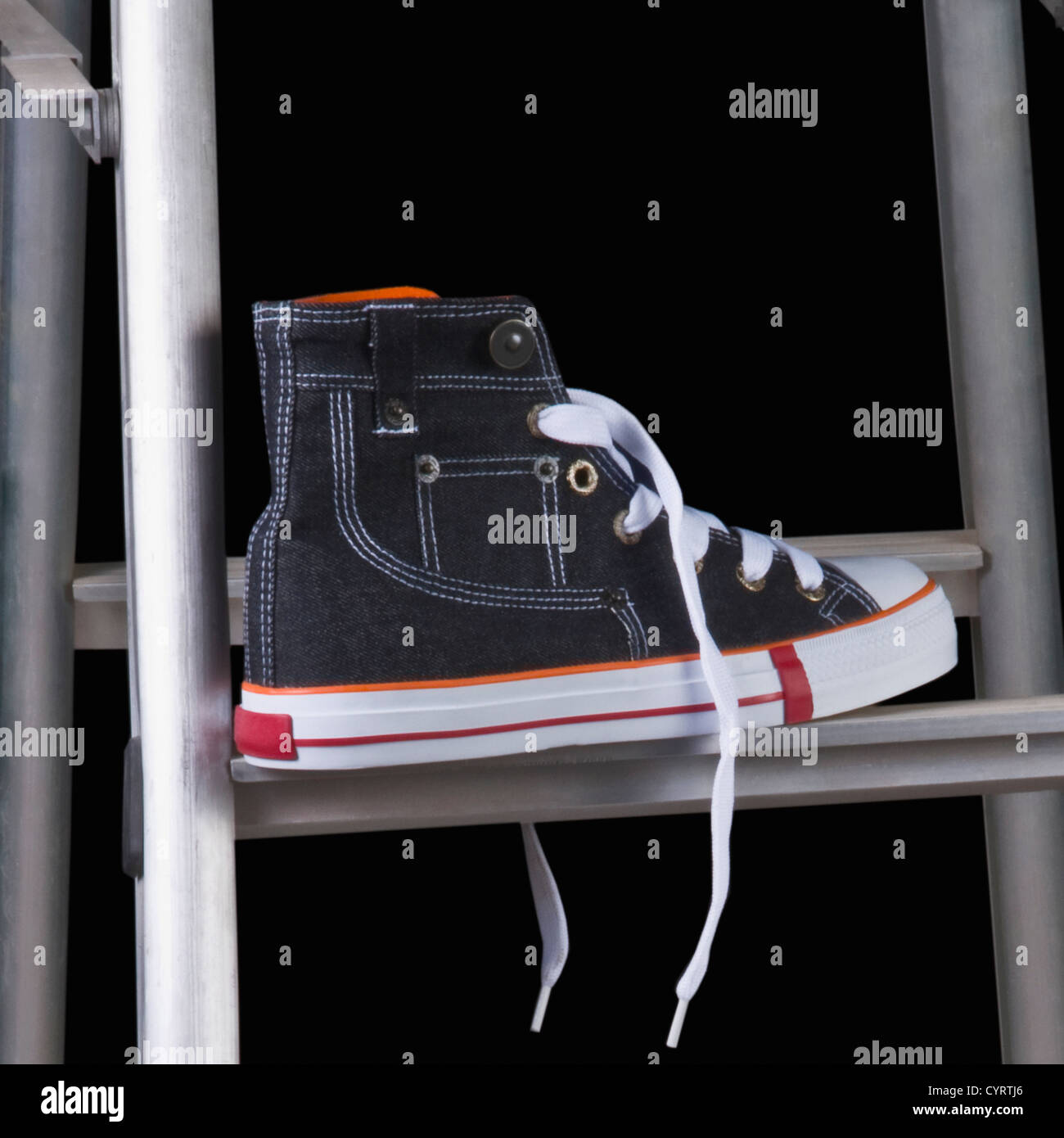 Close-up of a shoe on a step ladder Stock Photo - Alamy