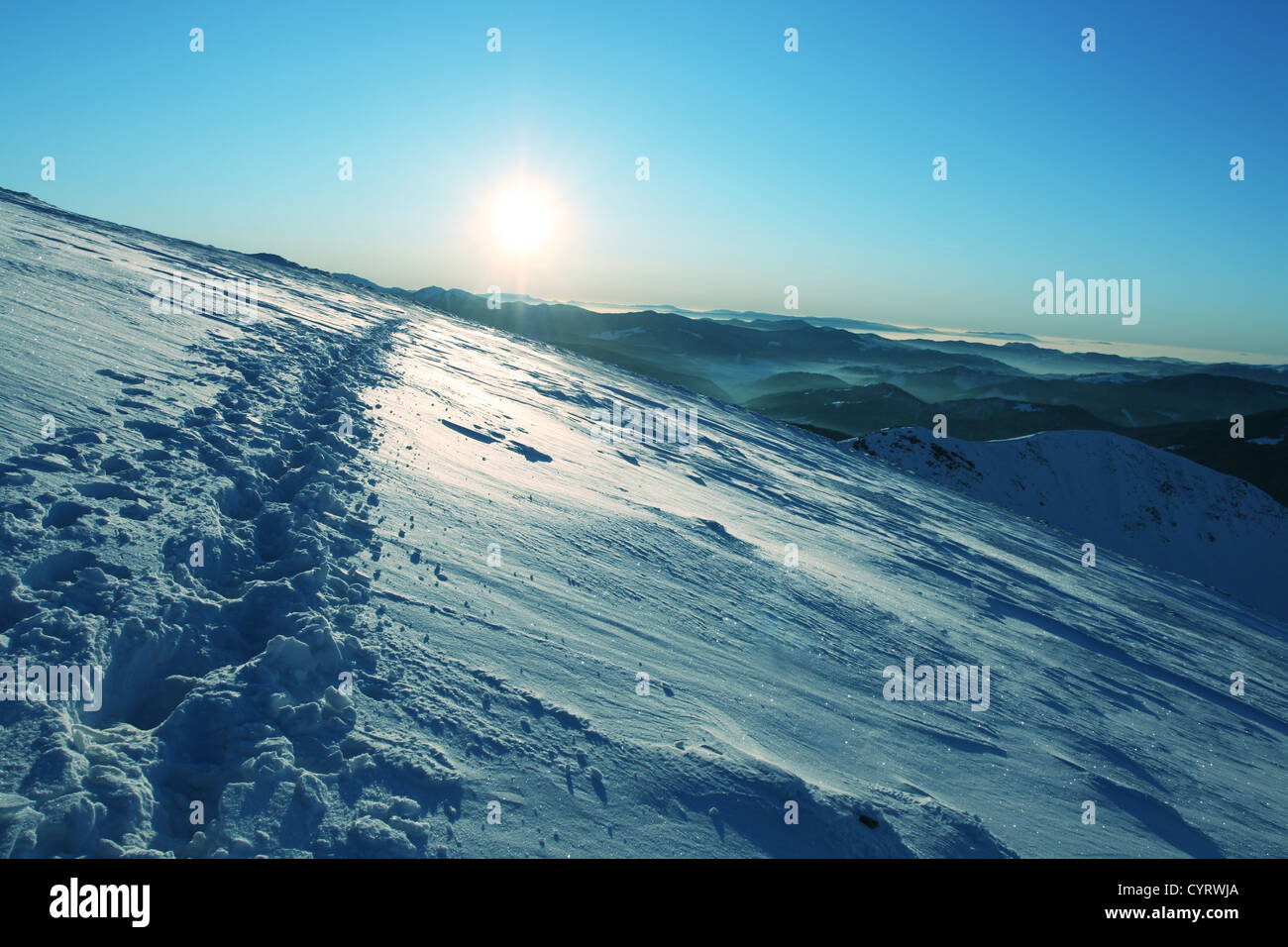 Sun and snow Stock Photo - Alamy
