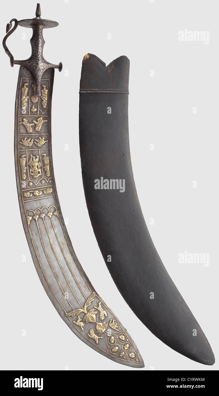 An Indian tegha, 19th century Wide blade with a T-shaped reinforced ...