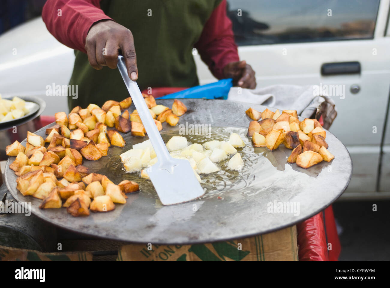 Indian man frying hi-res stock photography and images - Alamy