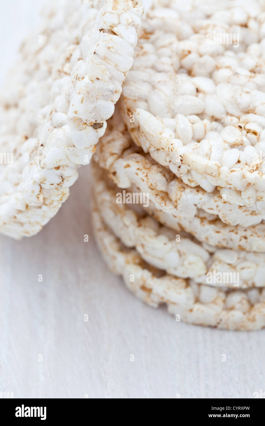 Pile of rice cakes on a white wooden board Stock Photo - Alamy
