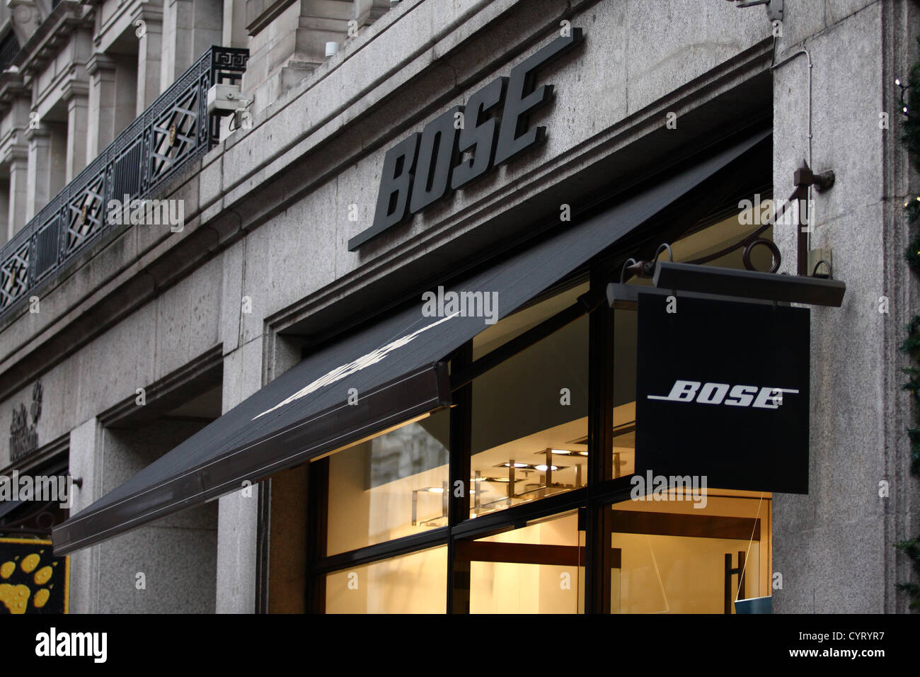 A hanging sign and shop sign for the Bose store in Regent Street London ...