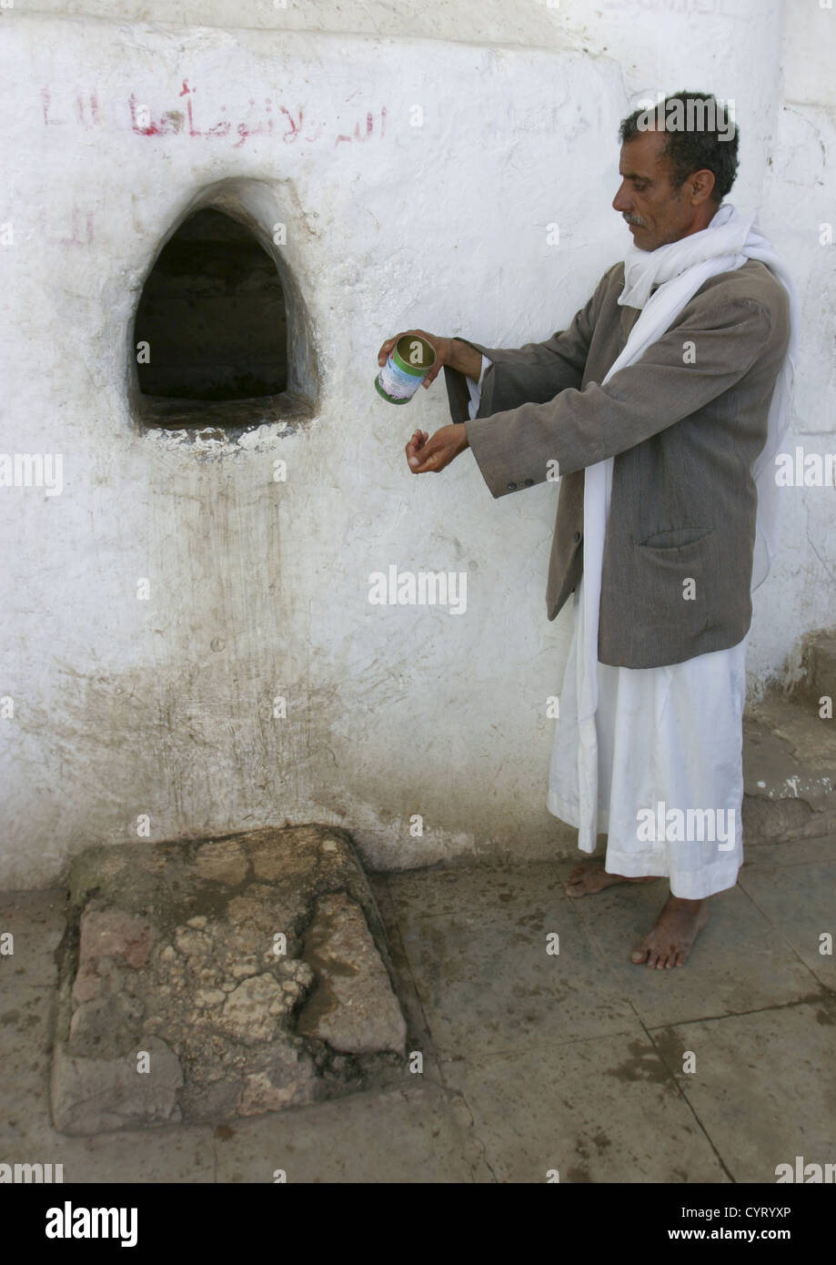 Man Doing Ritual Ablutions Before Prayer At The Mosque, Yemen Stock ...