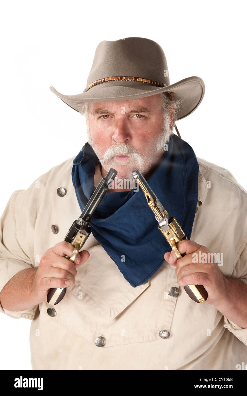 Cowboy with two hot pistols on white background Stock Photo - Alamy