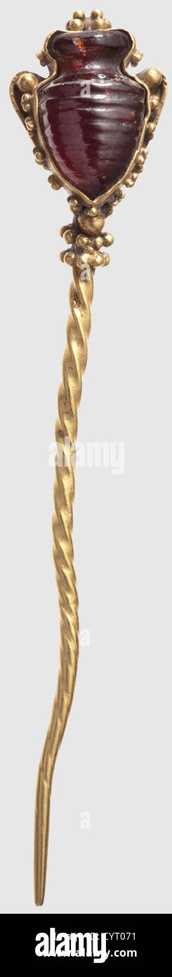 A Roman gold fibula set with a almandine, 2nd / 3rd century A.D. Sturdy ...