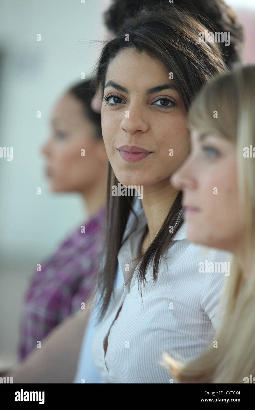 Portrait of women in a row Stock Photo - Alamy